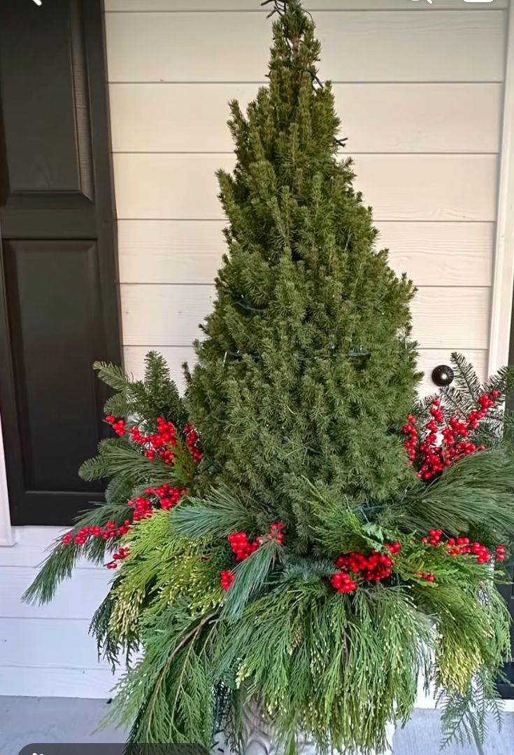 20 Festive Outdoor Christmas Planters » Lady Decluttered